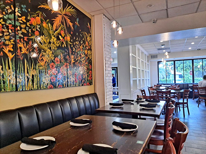 Art that feeds your soul while you wait for food to feed your body. Bold colors and tropical motifs set the perfect stage for culinary drama.