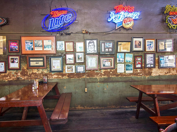 
The wall of fame showcases decades of barbecue glory. Those neon signs and framed accolades aren't just decoration &ndash; they're a timeline of excellence. 