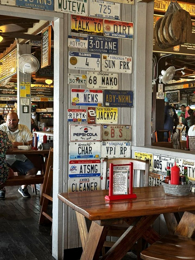 License plates from across America tell stories of travelers who came before you, all united by the universal language of fresh seafood.