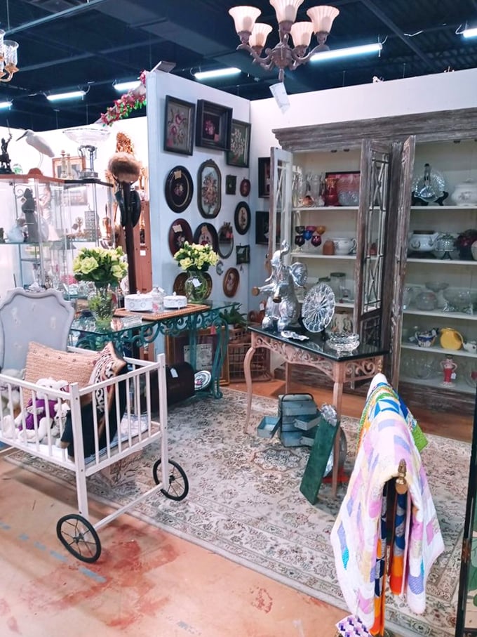 Elegance meets whimsy in this perfectly styled booth. That vintage baby carriage isn't just furniture &ndash; it's a conversation starter with wheels. 