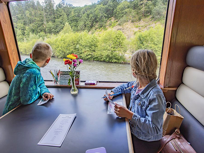 Two young artists capture the rushing river and emerald landscape&mdash;proof that Oregon's beauty inspires creativity in travelers of all ages.