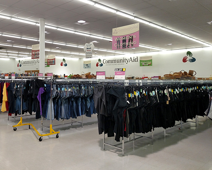 Women's clothing organized by type and color creates a shopper's paradise. That blouse in the middle? It's calling your name.
