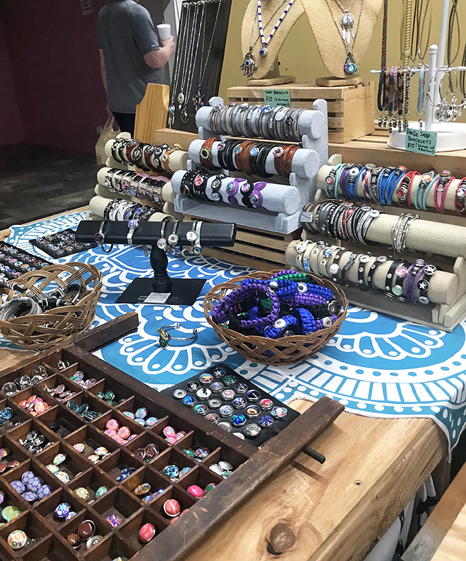 Jewelry displayed with loving care. These aren't just accessories &ndash; they're conversation starters and memory makers arranged in perfect, sparkling rows.