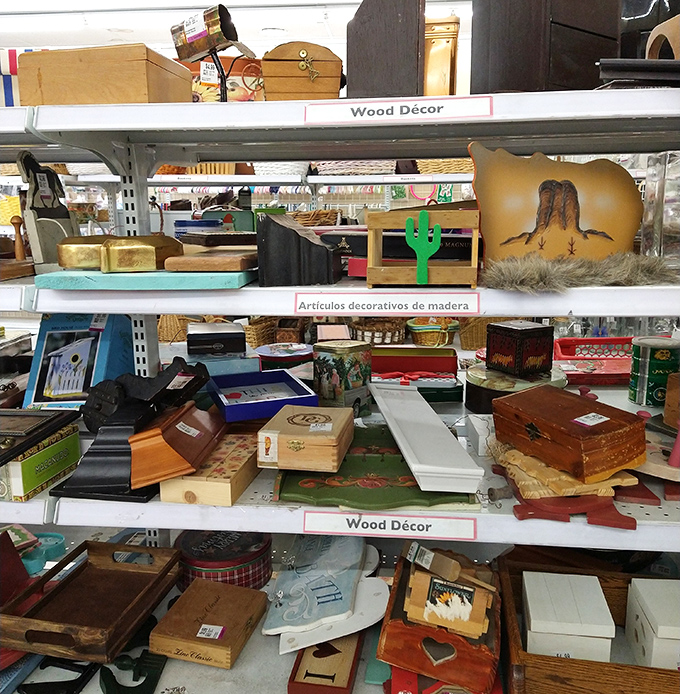 The wood d&eacute;cor section: where Southwestern cactus art meets vintage cigar boxes in perfect Arizona harmony.