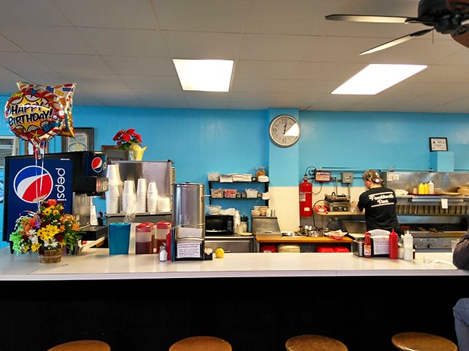 The classic diner counter where coffee flows freely and breakfast dreams come to life.