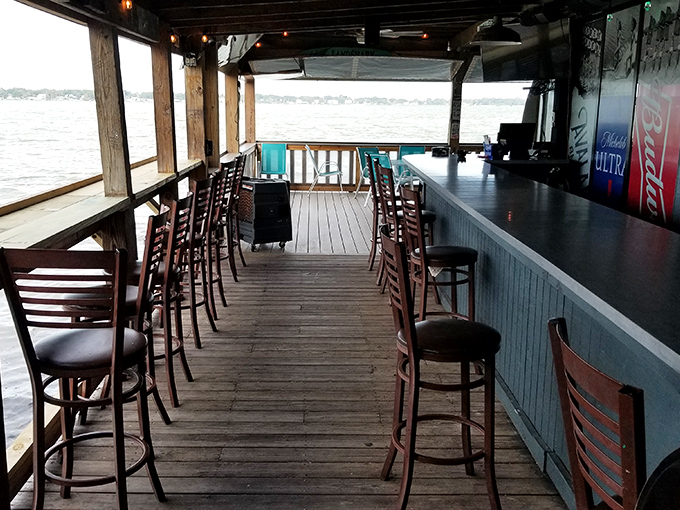 Bar seating with a water view that turns "I'll just have one drink" into "What time do you close?"