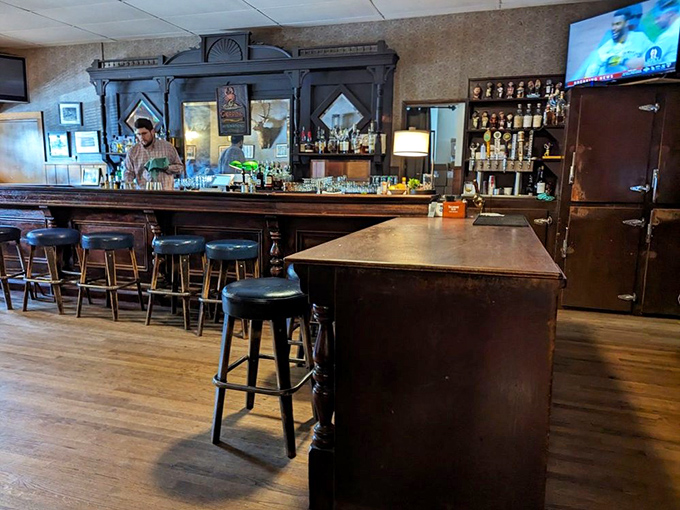 The bar stands ready like an old friend, promising stories and spirits in equal measure.