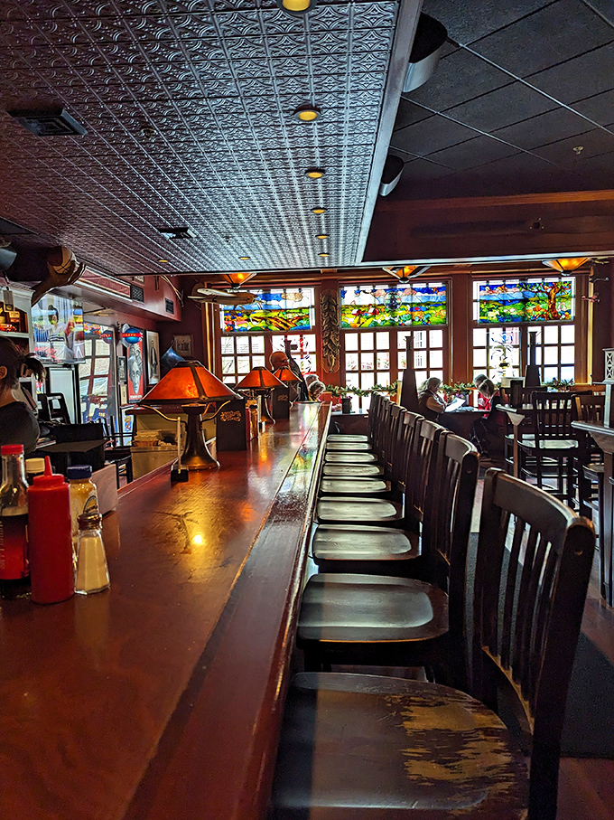 Where burger dreams and stained glass windows collide. The bar at Dotty's isn't just a place to sit&mdash;it's front-row seating to a culinary performance.