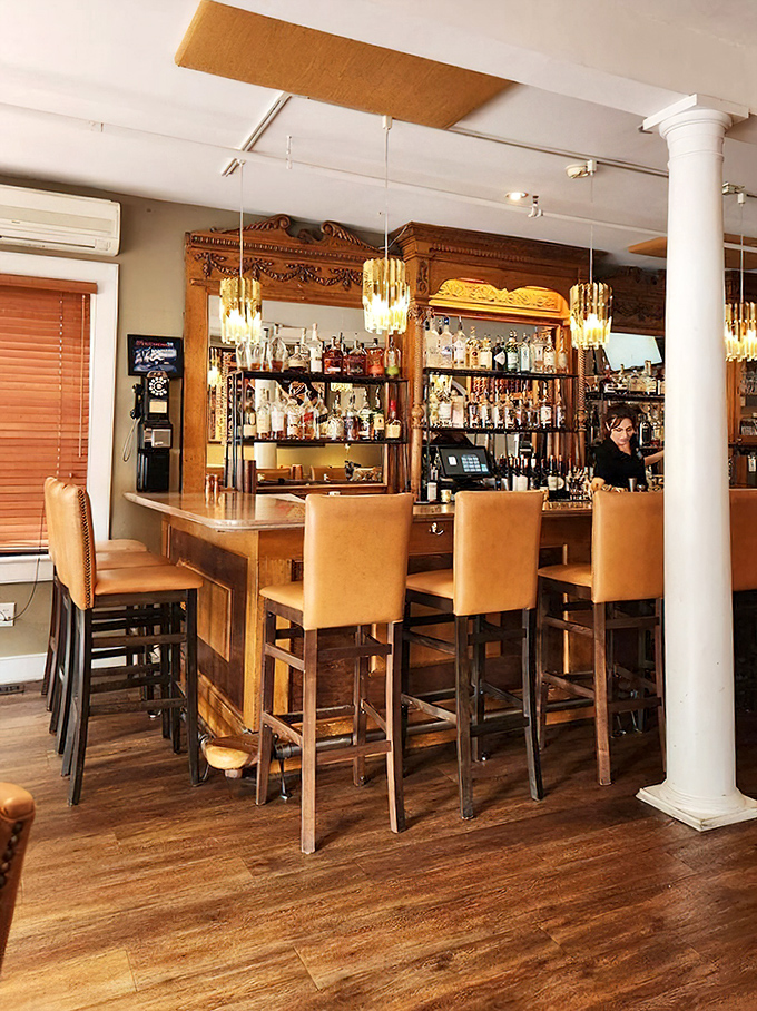 A bar that says "pull up a seat and stay awhile." The kind of place where strangers become friends over perfectly mixed old fashioneds.