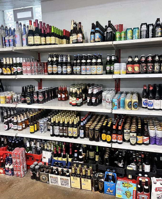 Beer bottles lined up like soldiers ready for duty. This isn't just inventory—it's possibility, adventure, and tomorrow's stories waiting to be poured.