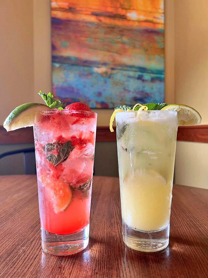 Cocktail artistry in full display—a strawberry mojito and classic margarita that prove Youell's liquid offerings are as thoughtful as their seafood.