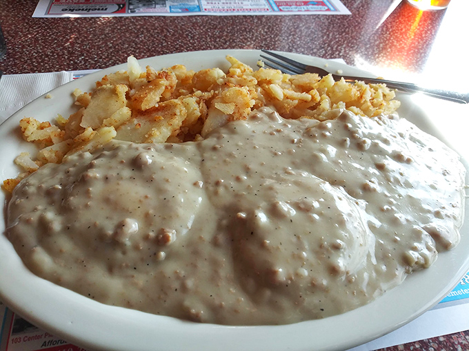 Biscuits and gravy&mdash;the breakfast that hugs you from the inside. This plate doesn't judge your life choices; it celebrates them.