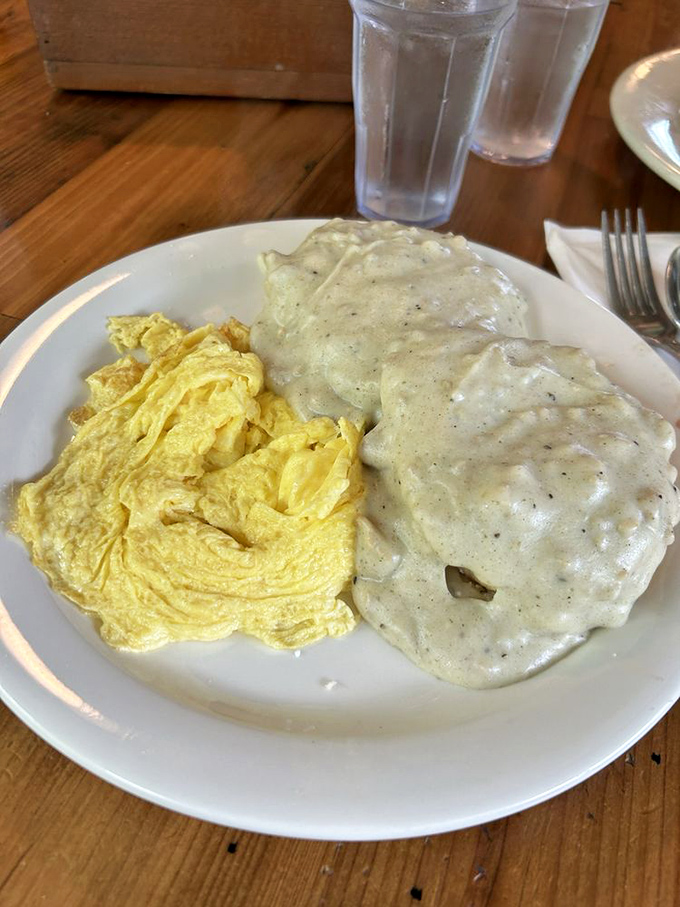 Biscuits smothered in gravy that could make a vegetarian temporarily reconsider their life choices. Southern comfort on a plate.