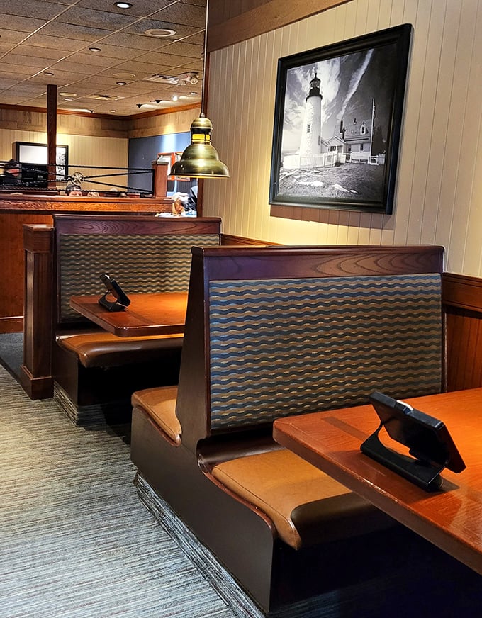 Cozy booth seating that invites lingering conversations over plates of oceanic treasures and warm biscuits.