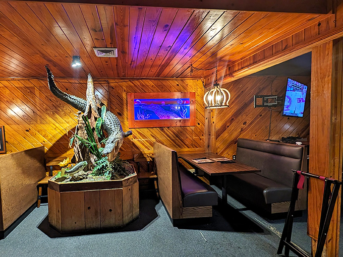 Cozy booths where food comas are born. That alligator display reminds you you're definitely in Florida, not some generic chain restaurant off the interstate. 