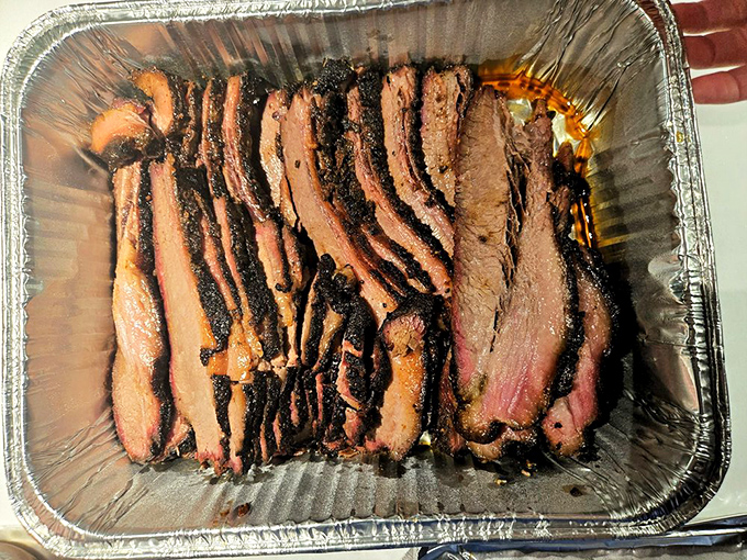 Brisket sliced with the precision of a surgeon and the reverence of a poet. Each piece tells the story of patience and smoke.
