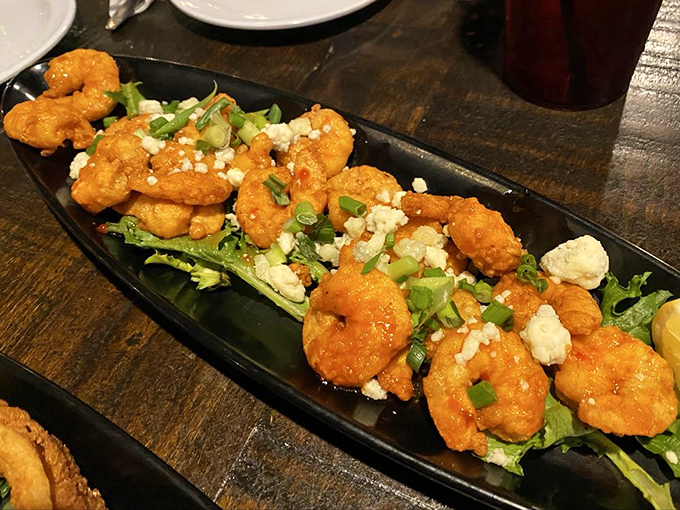 Buffalo shrimp that bring the heat without overwhelming the sweet. That sprinkle of blue cheese crumbles is like adding punctuation to a perfectly crafted sentence.