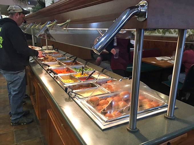 The buffet line beckons with its colorful array of vegetables and sides. Even confirmed carnivores might be tempted by those vibrant offerings.