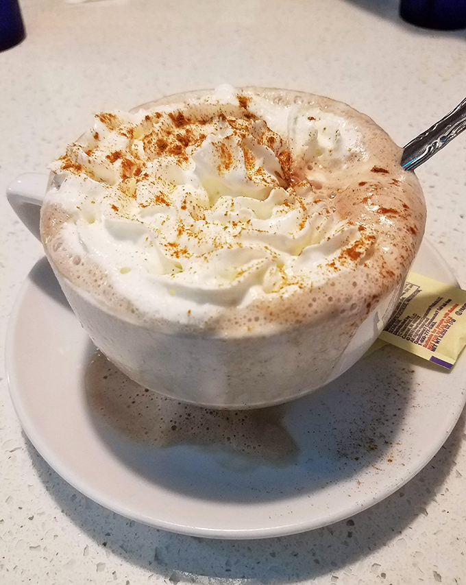 This isn't just coffee&mdash;it's a warm hug in a mug, topped with a cloud of whipped cream and a dusting of cinnamon that makes Monday mornings almost bearable.