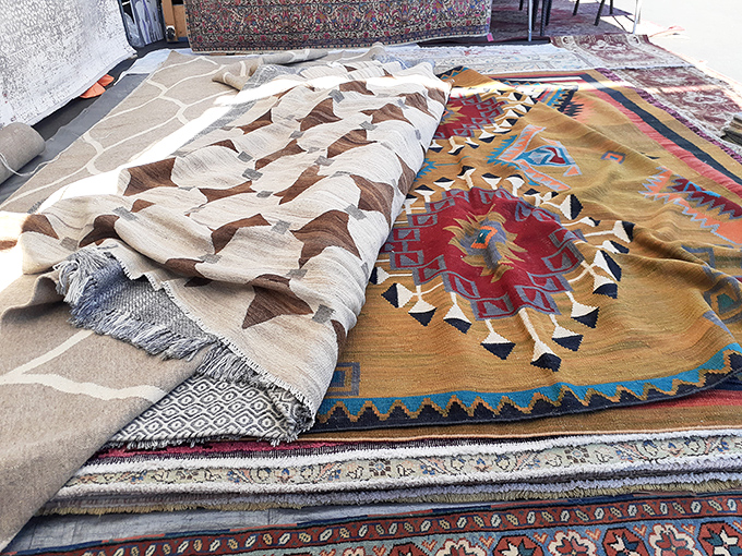 Textile heaven unfolds at your feet. These geometric patterns and rich colors have journeyed far to find their forever home in your living room.