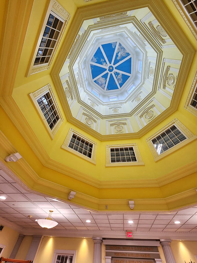 Looking up at this magnificent octagonal ceiling is like peering through a portal to another era—a sunny yellow time machine above your head.