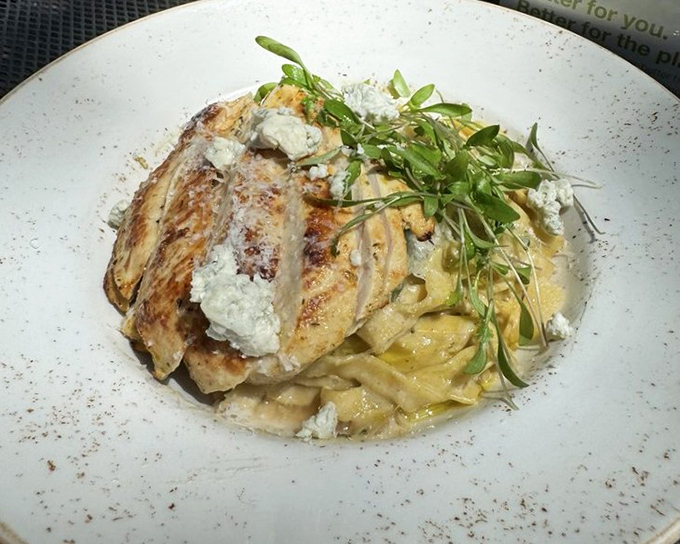 Chicken and pasta in perfect harmony. Those microgreens aren't just garnish&mdash;they're the confetti celebrating this plate of comfort.