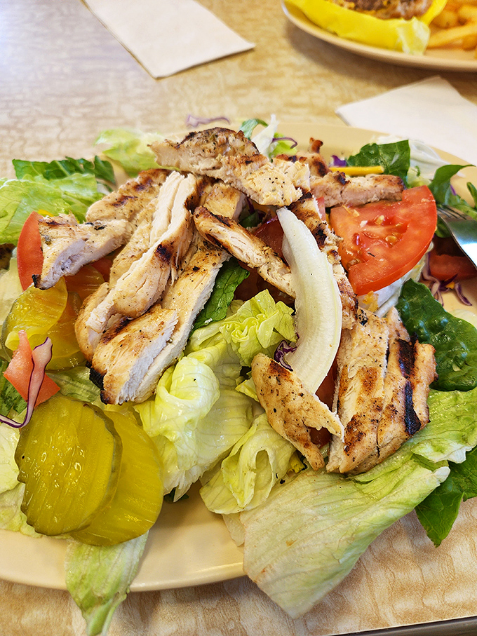 A chicken salad that doesn't feel like punishment. Fresh veggies, grilled protein, and enough color to make your Instagram followers genuinely envious.