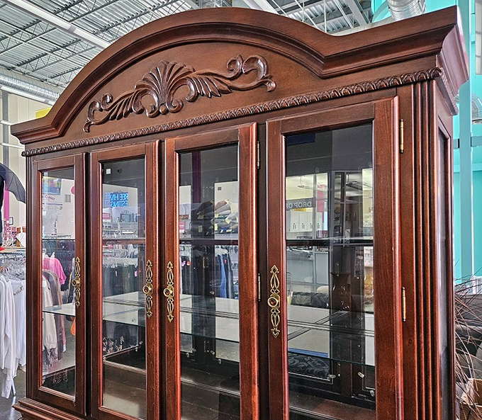 This stately china cabinet isn't just furniture&mdash;it's architectural ambition for your dining room, ready to showcase your grandmother's teacups.