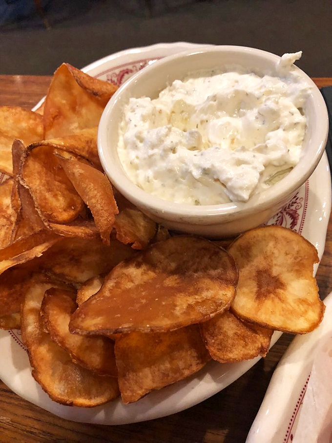 Homemade potato chips with creamy dip&mdash;the kind of simple starter that reminds you why sometimes the basics, done perfectly, are revolutionary.