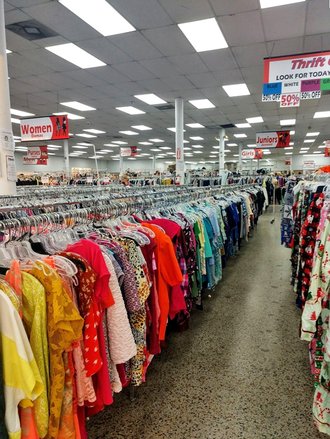 The organized chaos of color-coded clothing sections makes finding your next favorite outfit feel like an archaeological dig with immediate rewards.