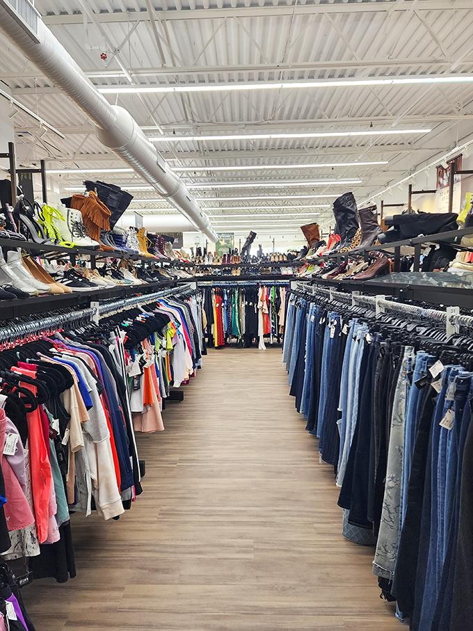 The denim section stretches into infinity, a blue jean dream where finding your perfect pair feels like winning the lottery without buying a ticket.