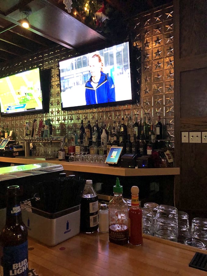 A bar backdrop that sparkles like a starry night, where bottles stand at attention ready to transform your ordinary Tuesday into something special.