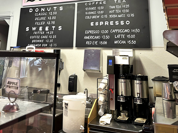 The coffee station stands ready to provide the perfect companion to your donut adventure. It's a beautiful relationship.