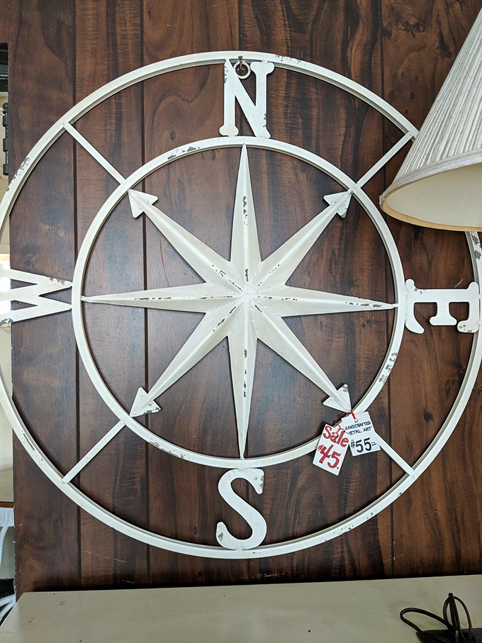 This weathered compass rose isn't just wall art &ndash; it's a reminder that the best discoveries often happen when we venture off course.