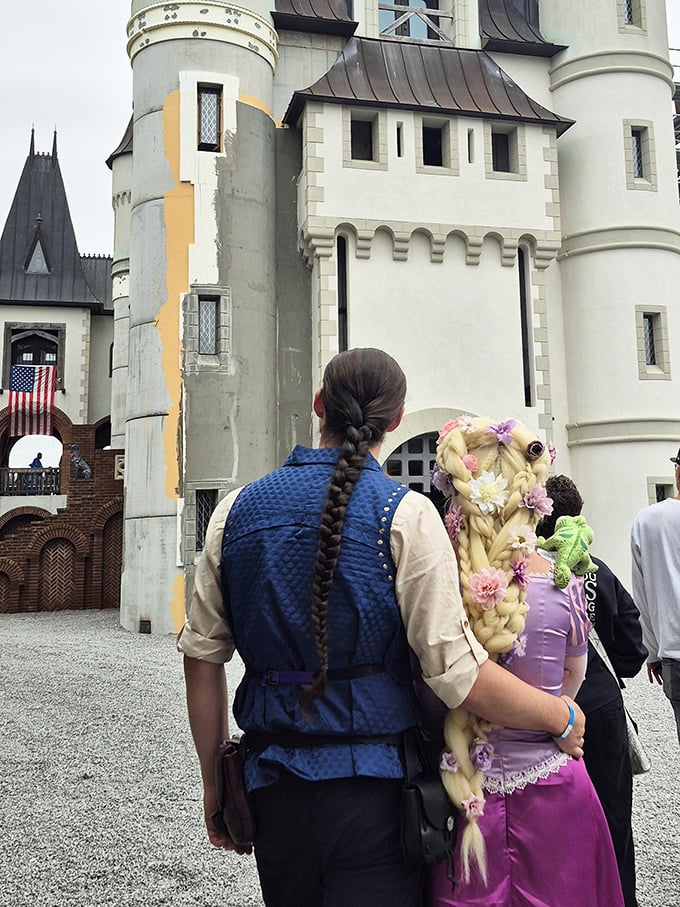 Renaissance fashion in full bloom! Festival attendees in period-perfect attire add living color to Castle Gwynn's stone fa&ccedil;ade during the annual Tennessee Renaissance Festival. 