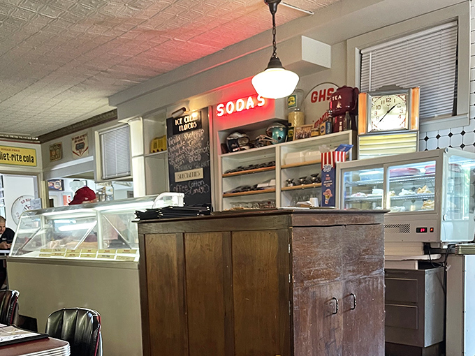 The counter area whispers of simpler times, when a good cup of coffee and a slice of pie could solve most of life's problems.