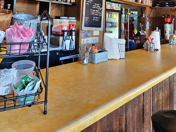 The counter of contemplation, where life-altering decisions like "brisket or ribs?" are made with the gravity they deserve.