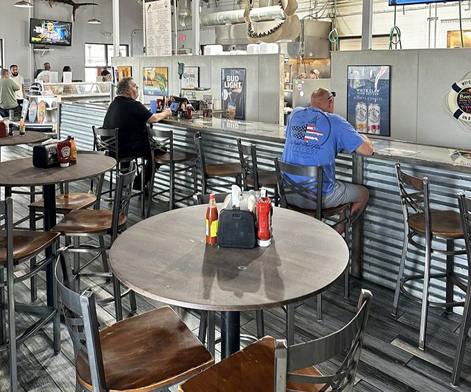 Where decisions are made and seafood dreams come true. The counter service setup says, "We're focusing on the food, not the frills."