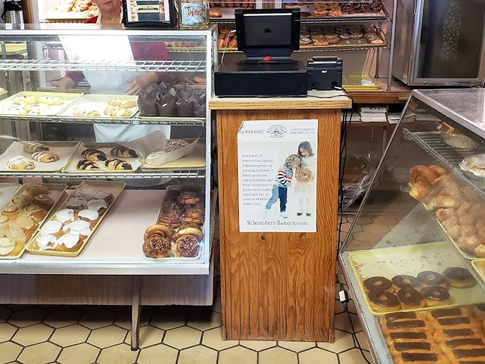 Behind the counter where magic happens daily. Like Willy Wonka's factory, but with less singing and more practical deliciousness.