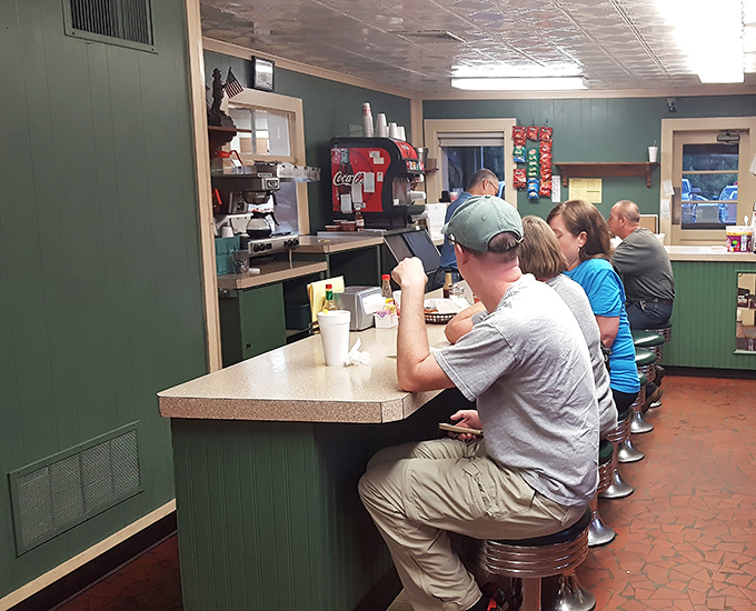 The counter seating offers front-row tickets to barbecue theater, where regulars and first-timers alike commune in the shared religion of smoked pork.