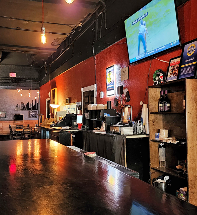 Where burger magic happens. The open kitchen design lets you witness the choreography of culinary creation from comfortable counter seats.