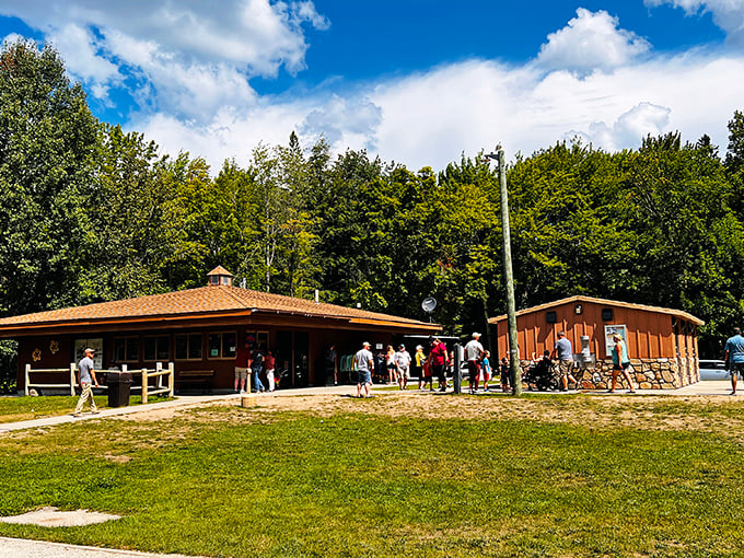 Where word-of-mouth becomes reality. Visitors gather at the park facilities, eager to experience the spring's legendary beauty firsthand. 