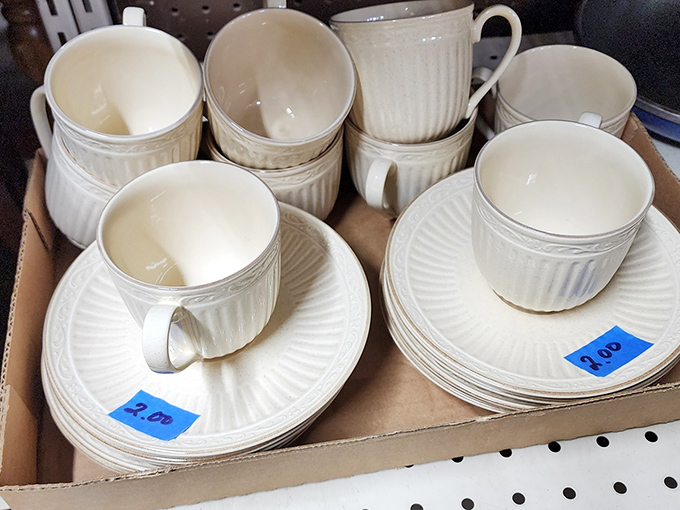 Elegant simplicity in white porcelain. These cups and saucers at $2 each are begging to host your morning coffee or afternoon tea.