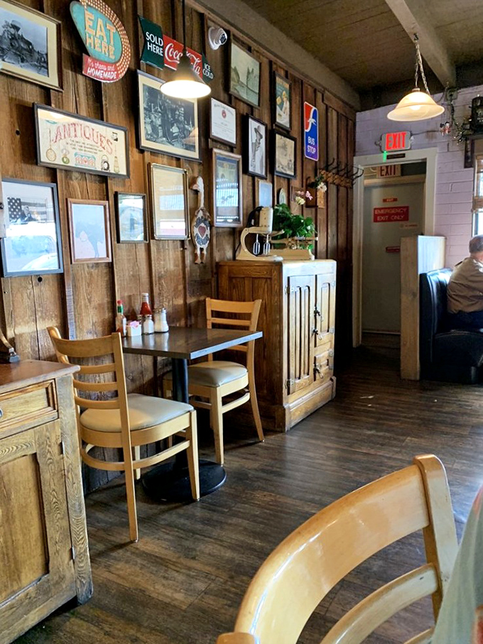 Every photograph and sign tells a story, creating walls that celebrate community, history, and good taste.