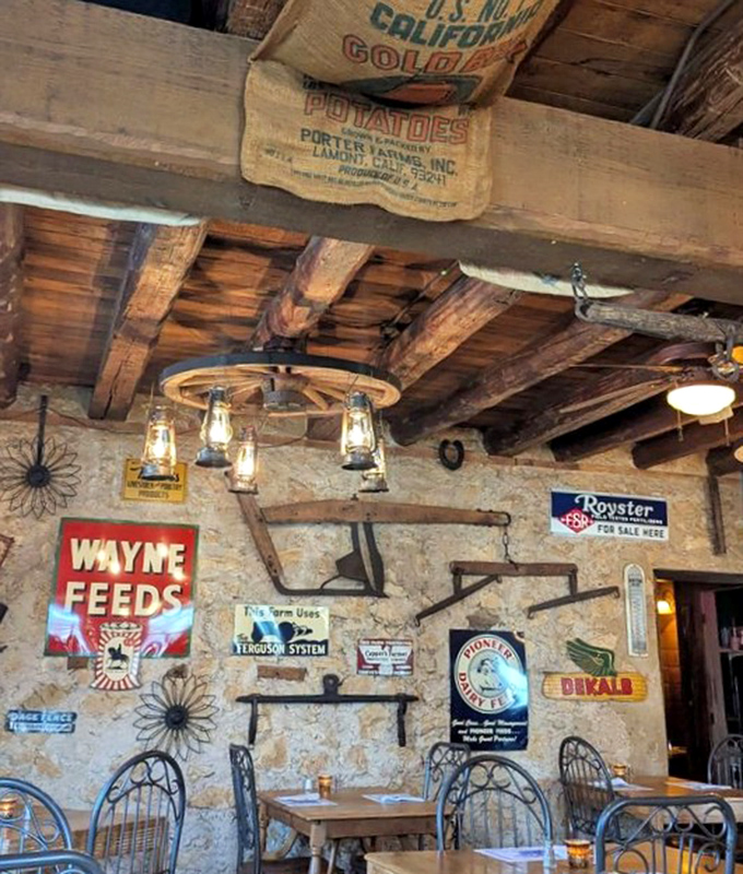 Look up and discover history hanging from the rafters&mdash;vintage potato sacks and farm implements that have found their forever home.