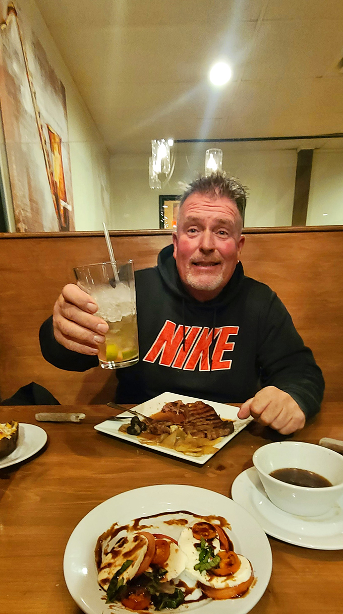 Every table tells a story&mdash;this one featuring what appears to be a very happy diner celebrating the universal language of "this tastes amazing!"