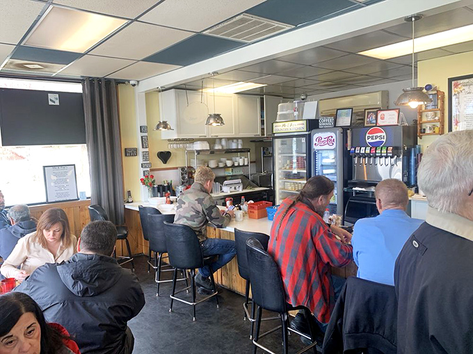 The morning ritual unfolds&mdash;locals gathering at their usual tables, newspapers open, coffee flowing, and conversations picking up where yesterday left off.