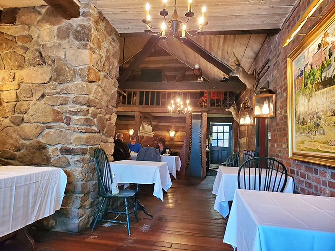 Dining beneath exposed beams and stone walls creates an atmosphere that Instagram filters try desperately to replicate. History never tasted so good.