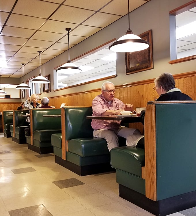 Where locals gather to share news, solve world problems, and indulge in comfort food classics. These booths have heard it all.