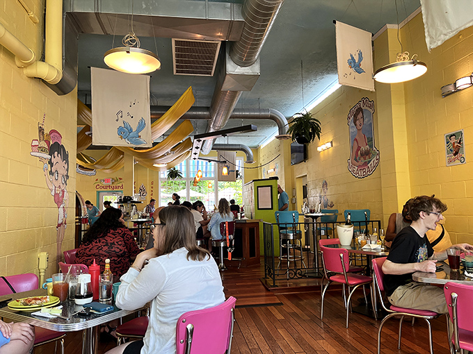 Where strangers become temporary breakfast companions, united by the universal language of "pass the syrup, please."